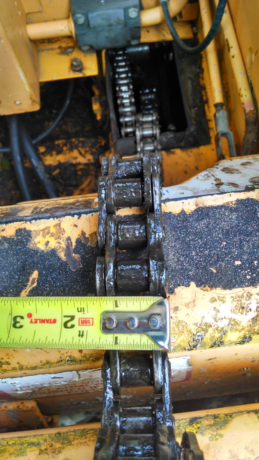 Mustang 940 Skid Loader: Bearing, Chain, and sprocket replacement
