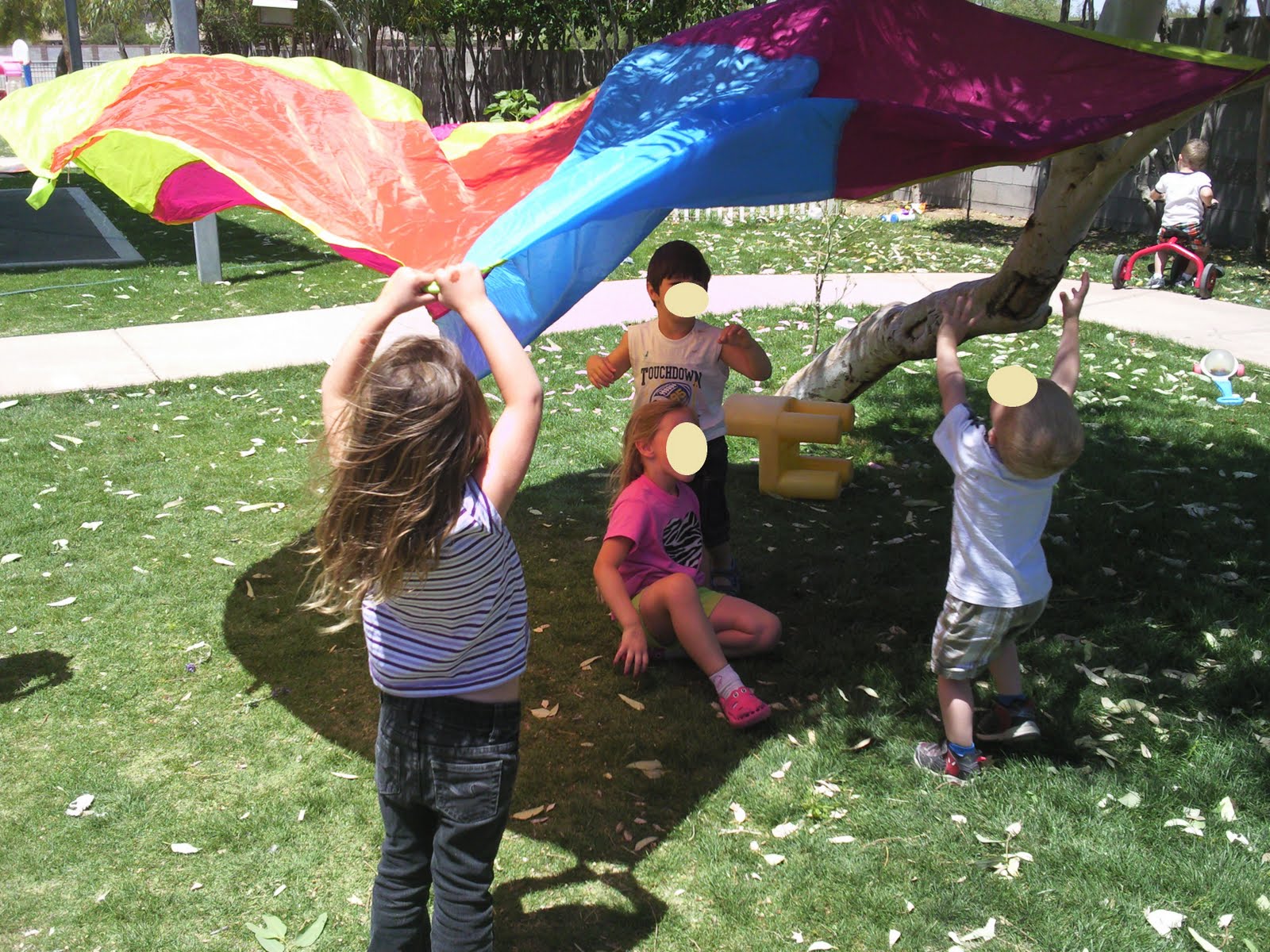 Play-Based Classroom: Exploring wind with a parachute