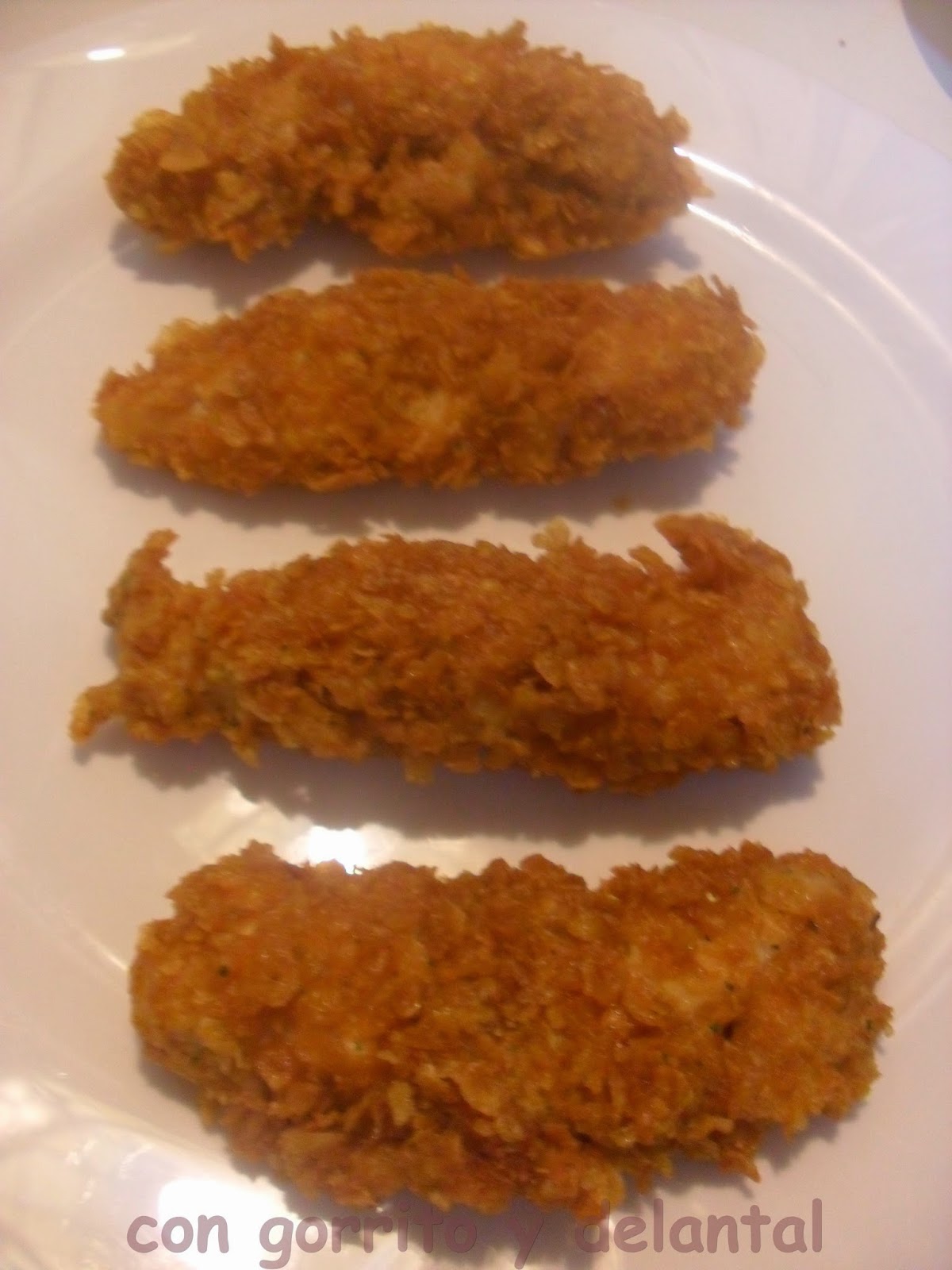 CON GORRITO Y DELANTAL: Pollo crujiente a lo KFC