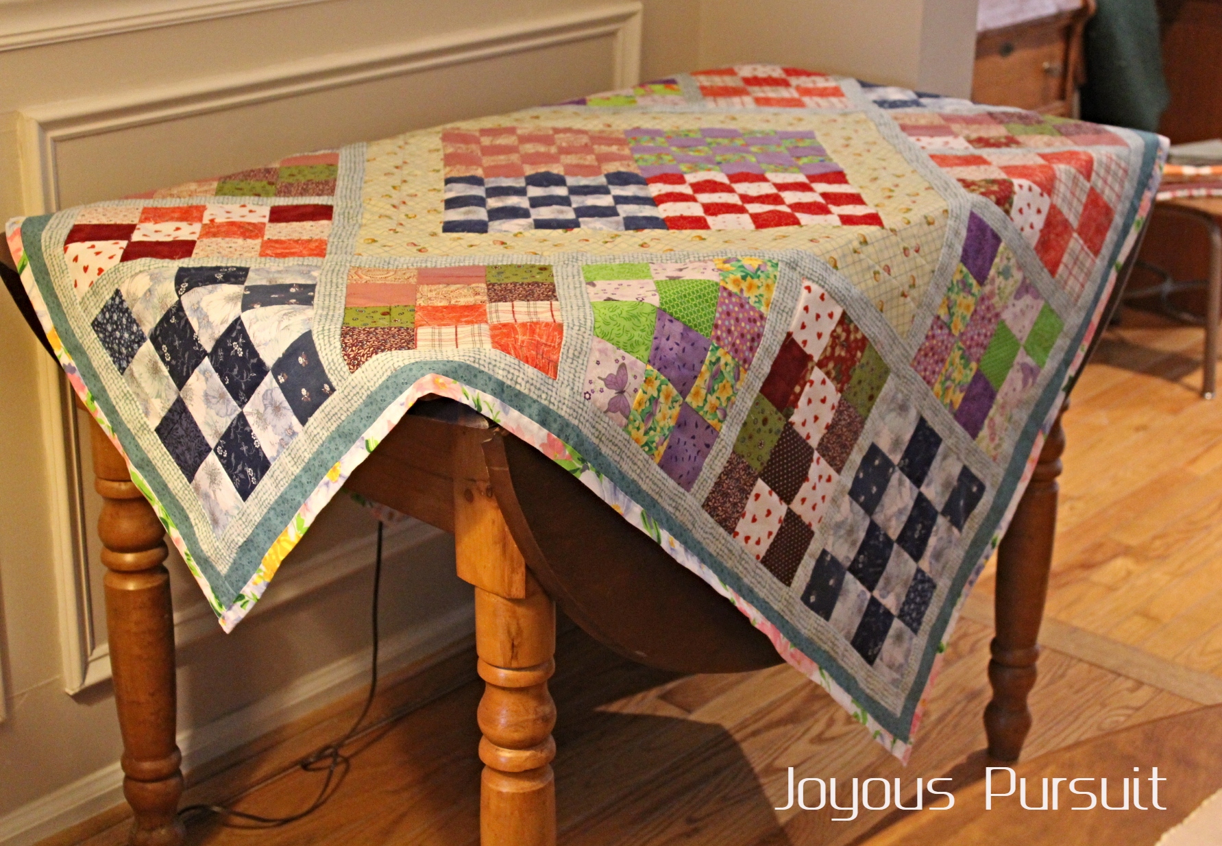Joyous Pursuit: Table Quilt