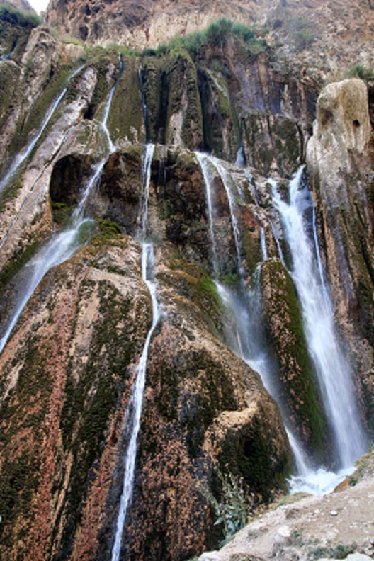 Oriental Rugs: Crags Sheltering Margon Waterfall