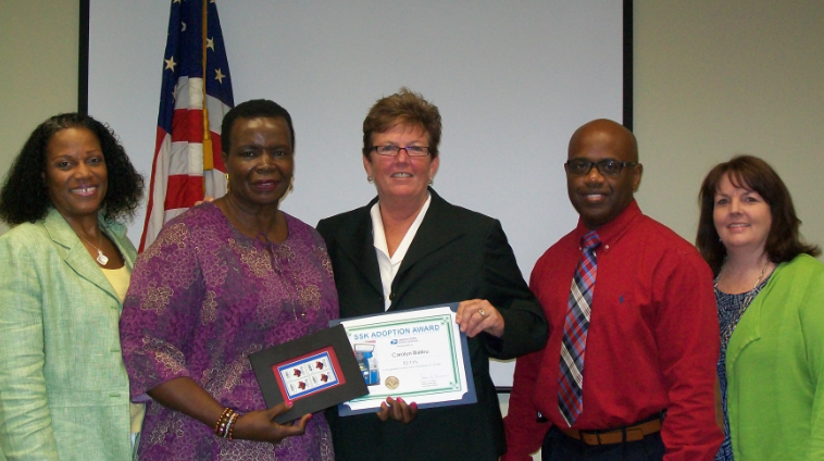 Gulf Atlantic Newsmakers: District Manager Aronson recognizes Carolyn ...