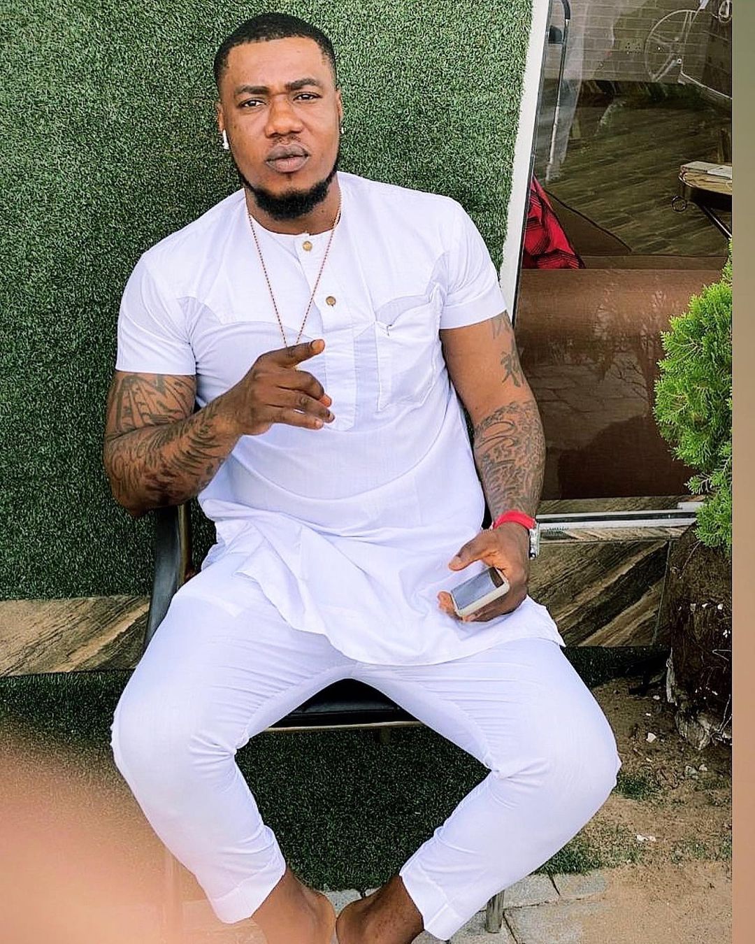 Tattoo photos of Young Mula Desmond Dozie