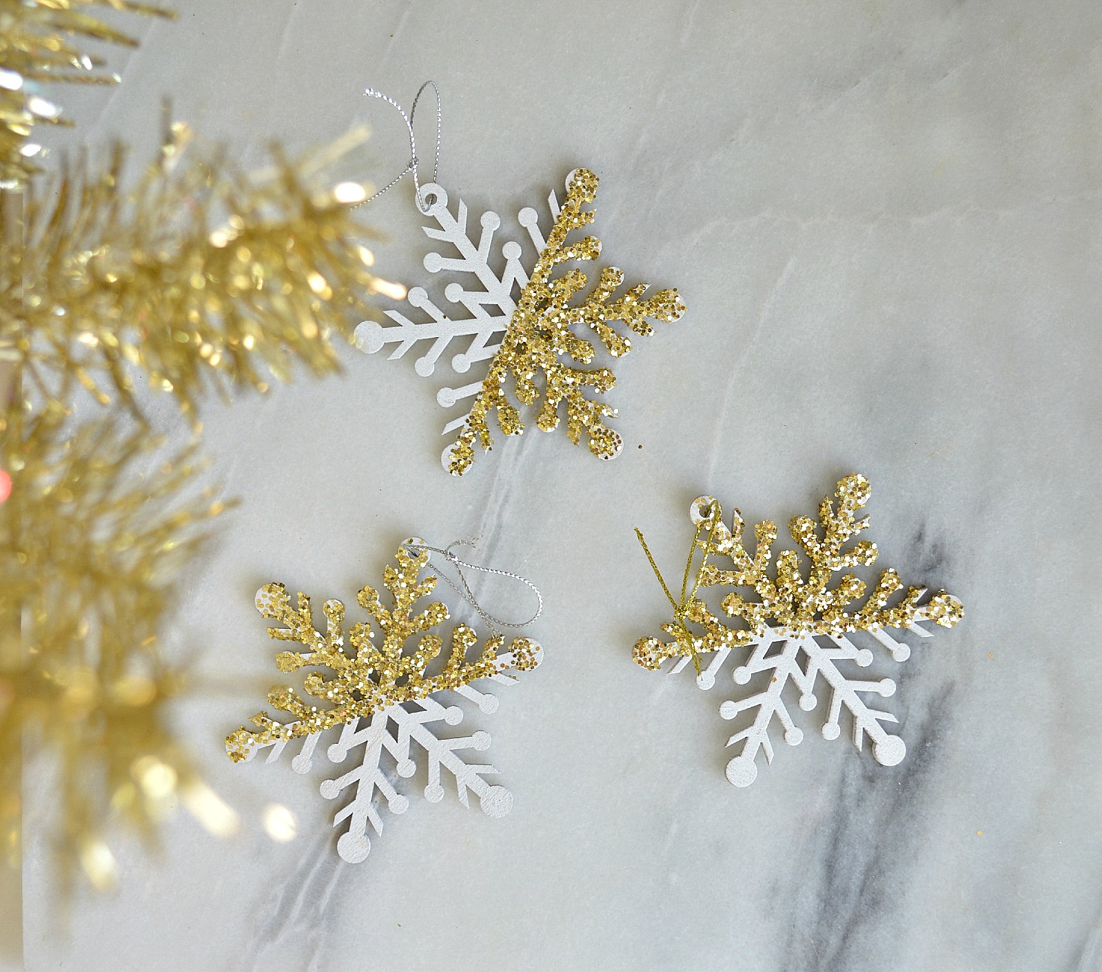 DIY : Glitter Dipped Snowflake Ornaments - This Design Journal