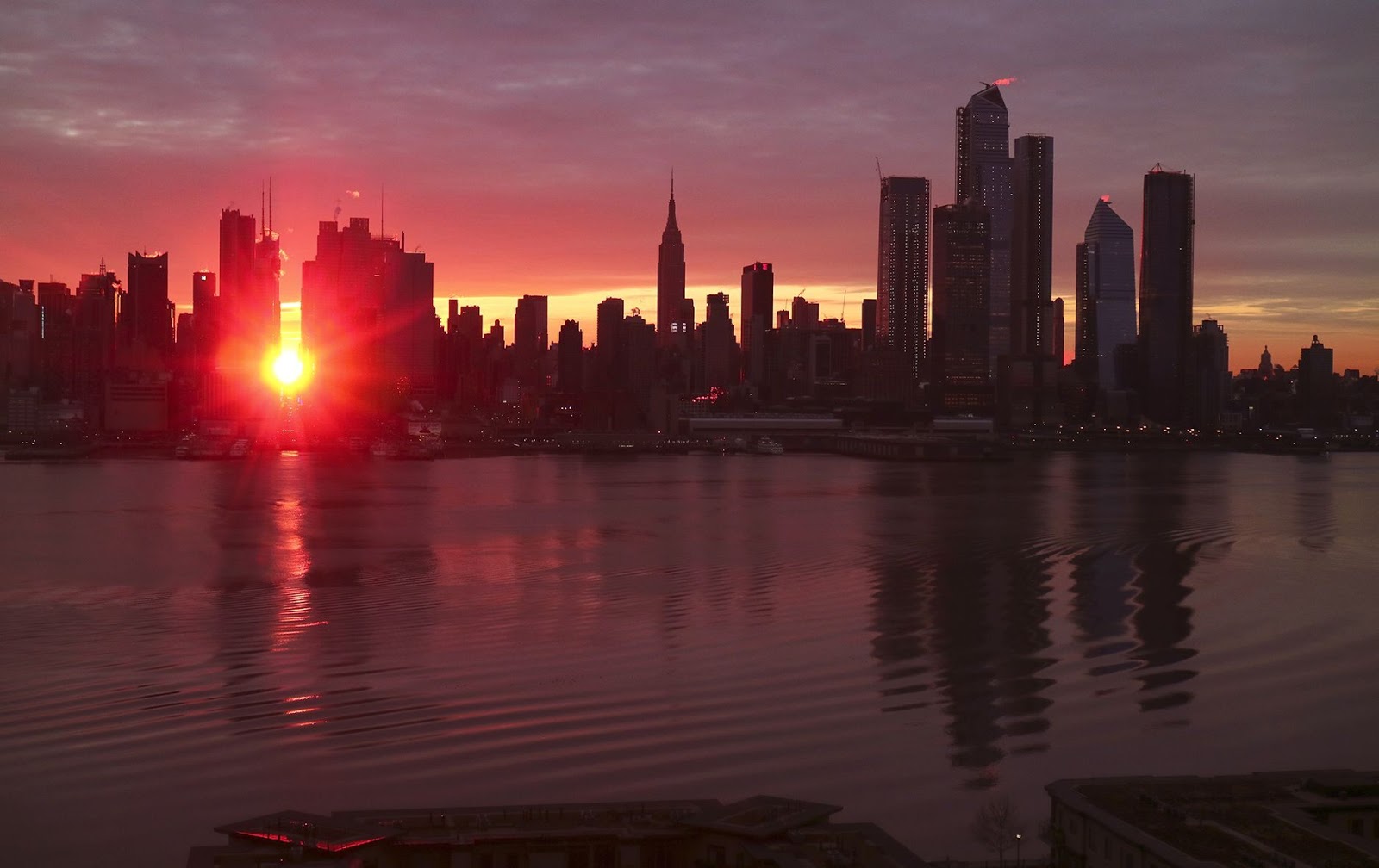 PolarShark: The sun rises down 42nd Street during a Manhattanhenge sunrise