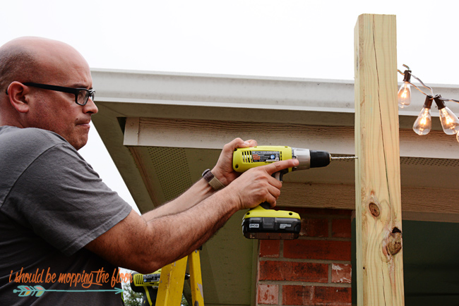 DIY Patio Area with Texas Lamp Posts | i should be mopping the floor