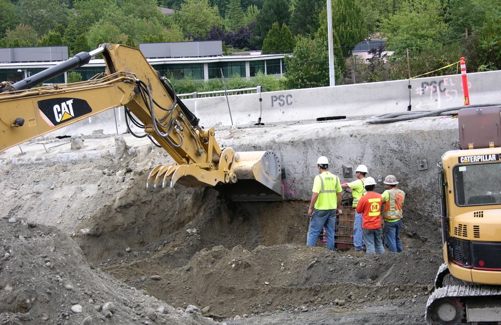 Soil excavation by machine and by hand - Civil Engineering