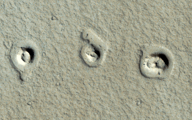 Areology: Rootless Cones and Inflated Lava Flows in Amazonis Planitia