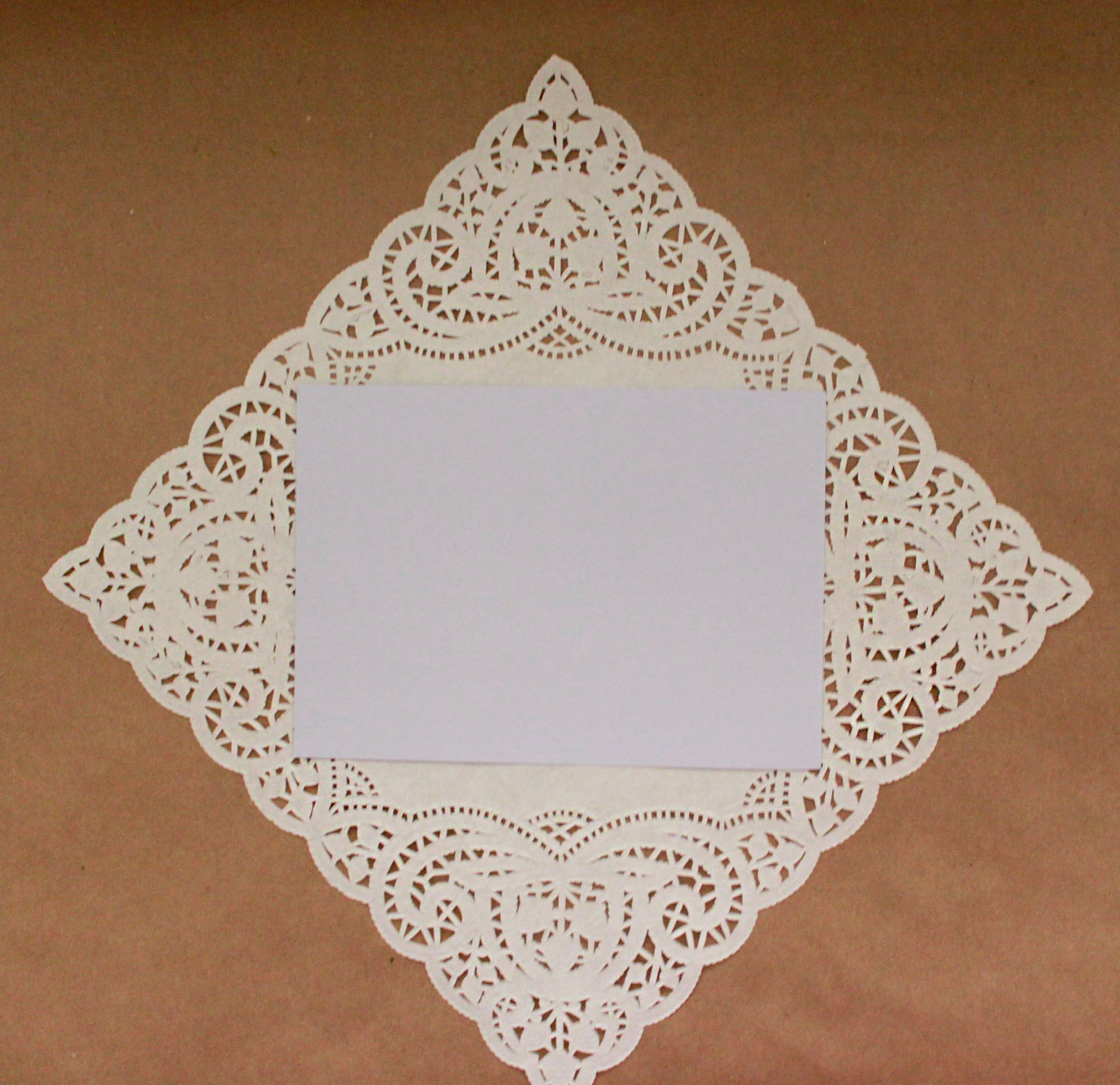 Doily is face down with template aligned.