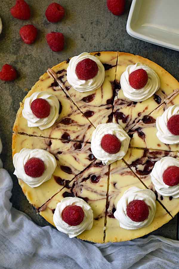 Raspberry White Chocolate Cheesecake with Oreo Crust | Life Tastes Good
