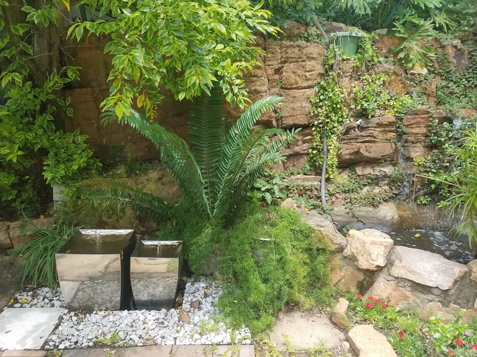Creating a water feature using the natural vertical rock face