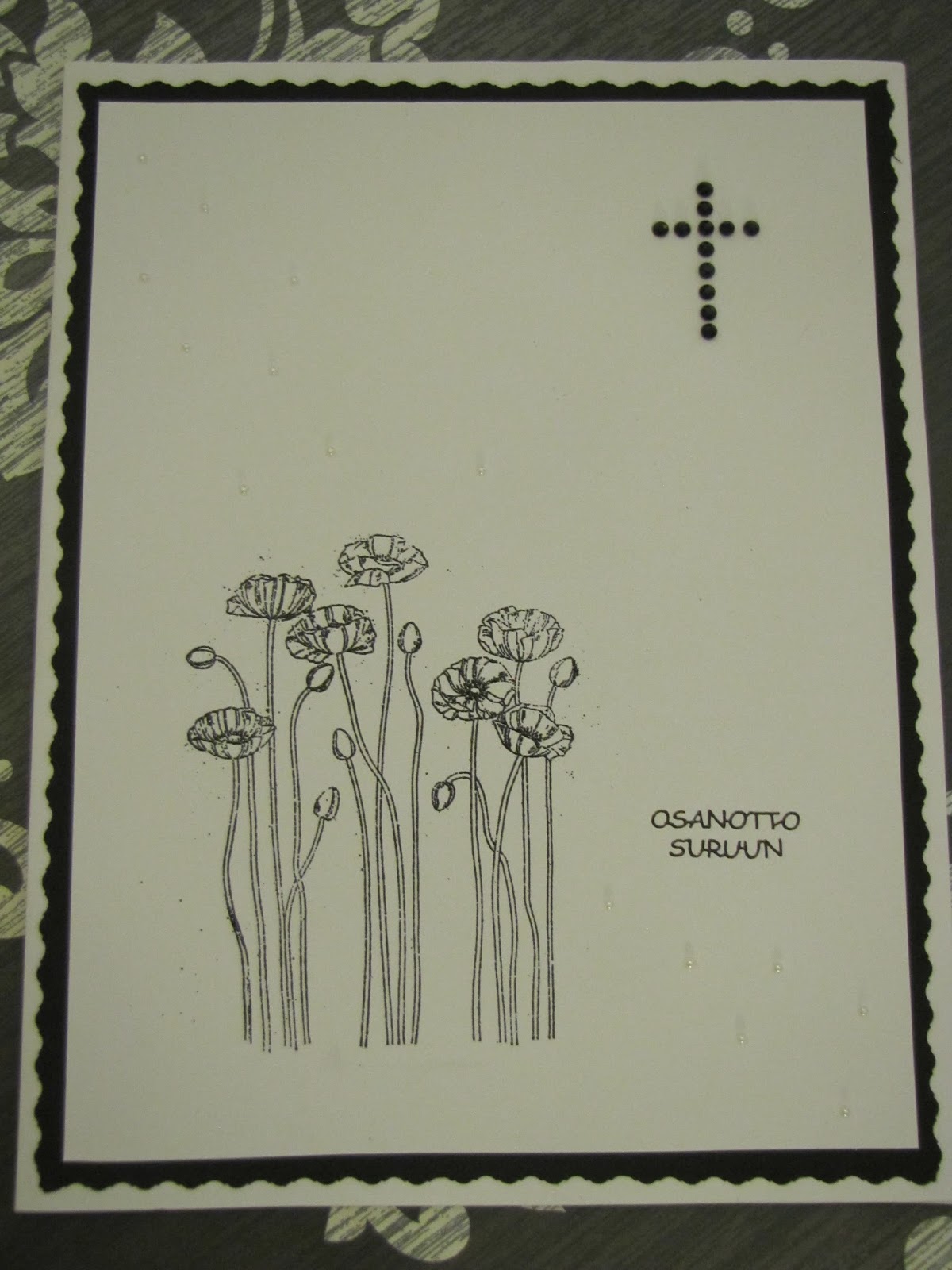 Koristenappi: Osanotto