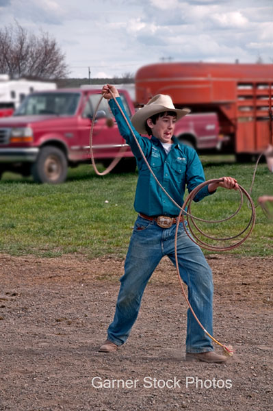 Stock and Fine Art Photos: Young Cowboy Practices Roping Skills