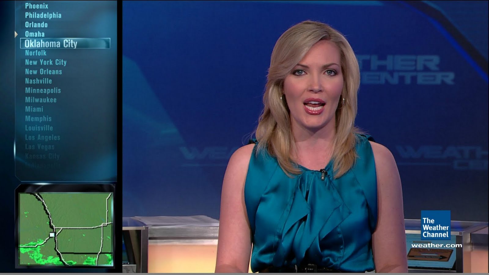 Ladies in Satin Blouses: unknown Weather Channel anchor in green satin top