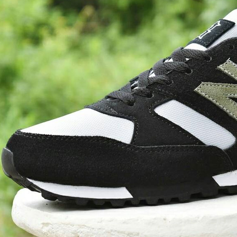 New Balance Classic GO Hitam Hijau Putih | Omsepatu.com