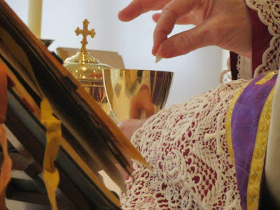 In The Tiniest Particle Of The Consecrated Host Christ Is Fully Present