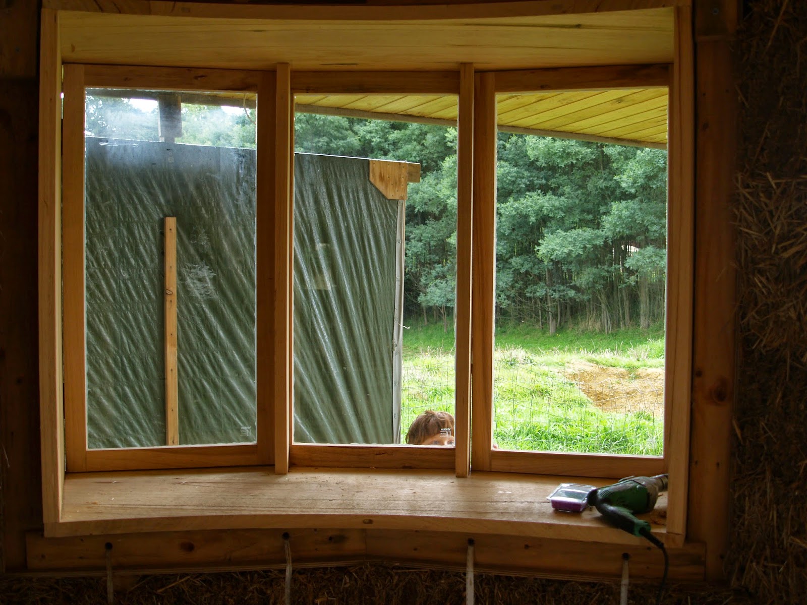 Building the round strawbale house: Curved timber windows