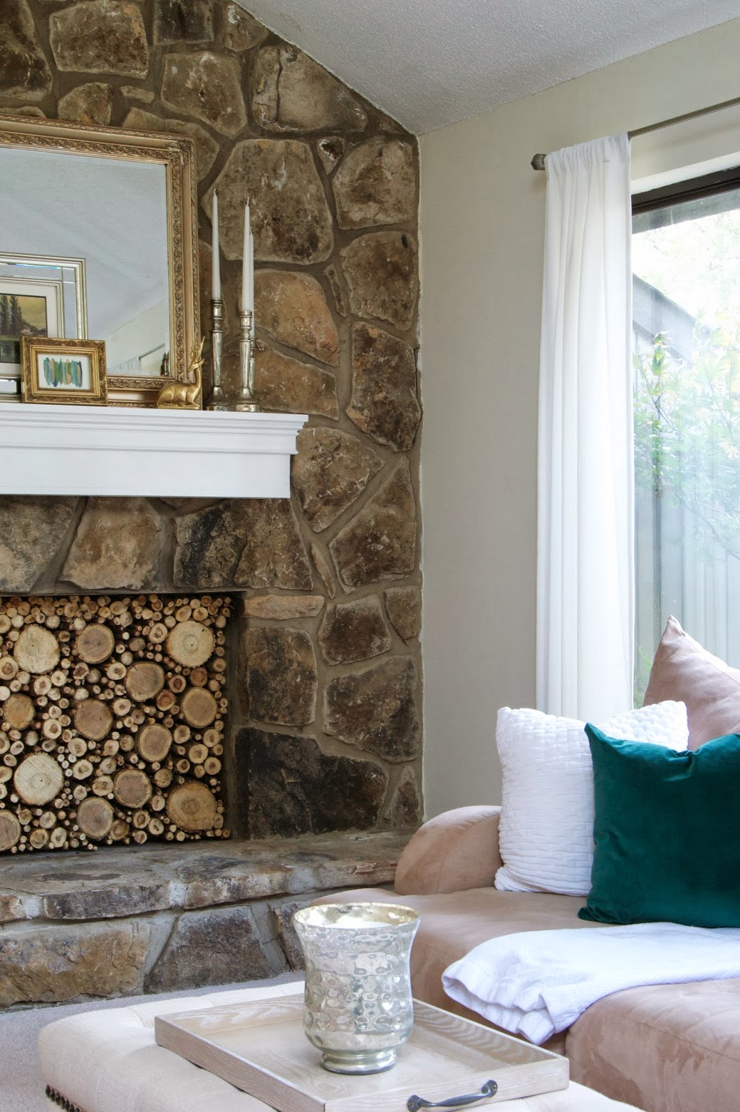 Faux Stacked Log Fireplace Tutorial | LiveLoveDIY | Bloglovin’