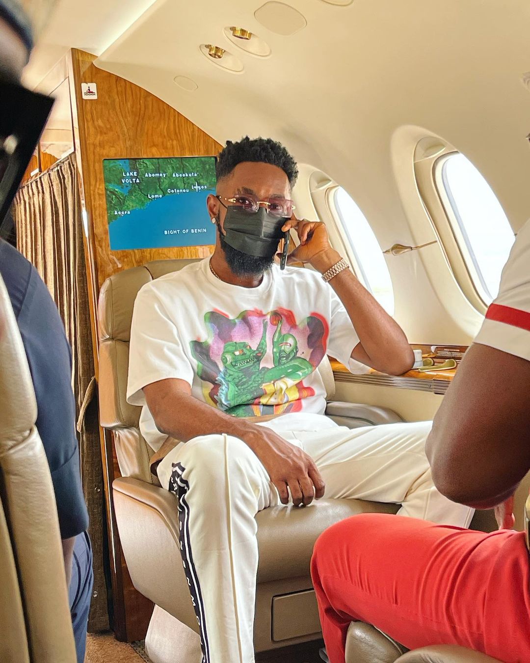Photos of Patoranking in a private jet