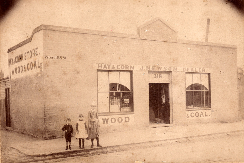 Interesting Photographs Capture People Standing in Front of Stores Over ...