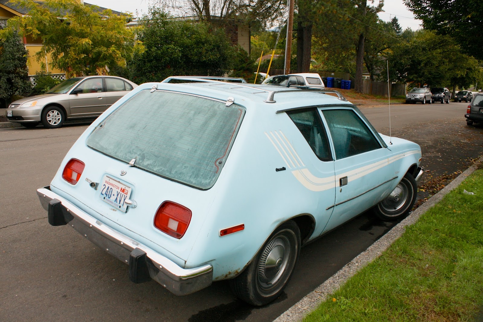 OLD PARKED CARS.: 1977 AMC Gremlin.