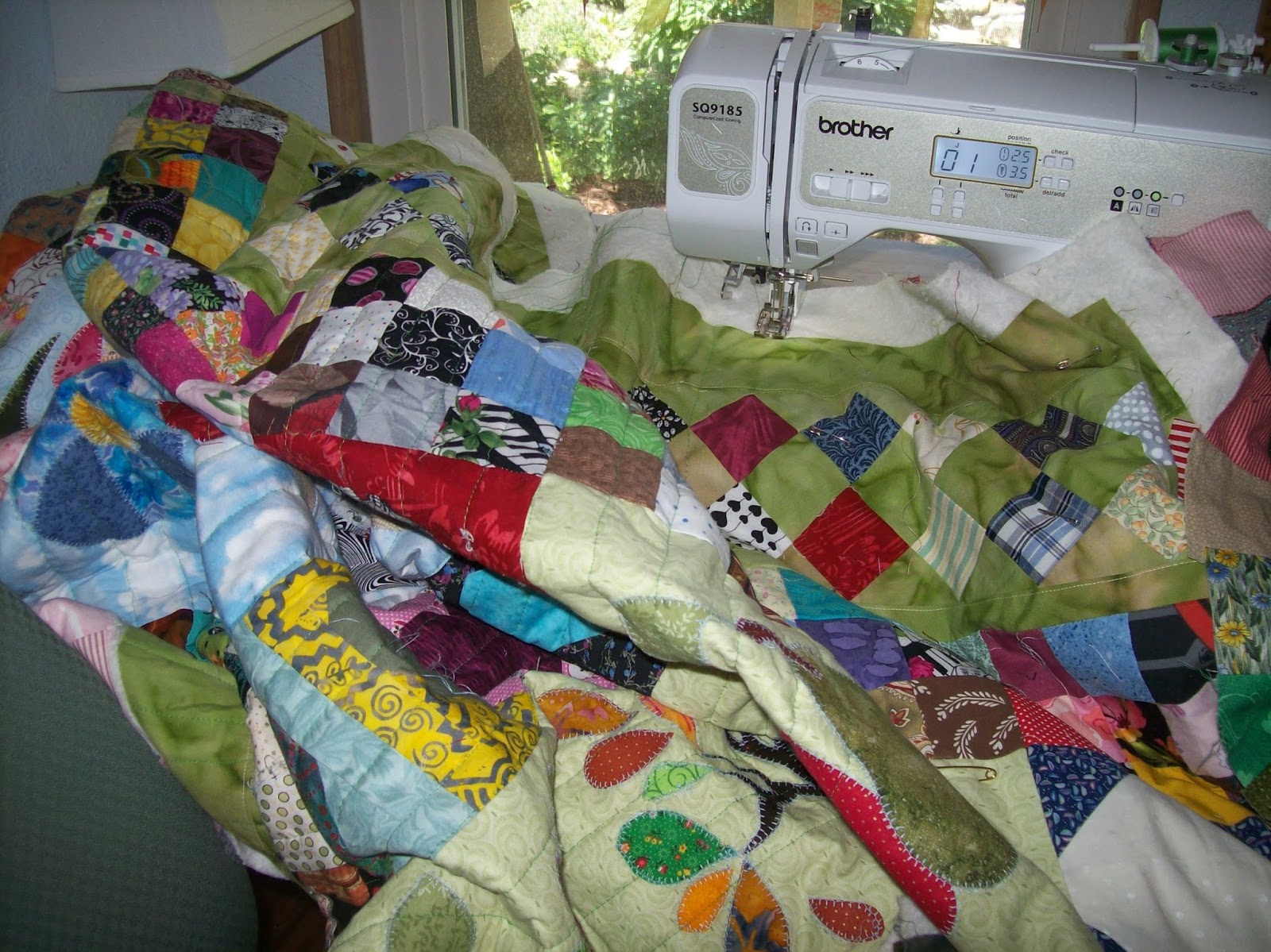 Every Stitch a Prayer: Row Crops...errr...Quilts. Row Quilts