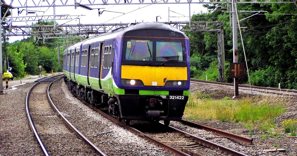 'Along These Tracks' Train Photos Site : Photo Silverlink EMU Train Class 321422 Wolverton 1990s