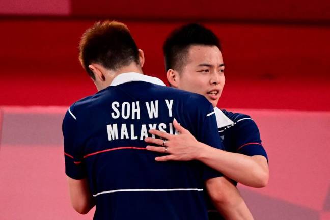Malaysia's Aaron Chia & Wooi Yik Win Olympics Bronze Medal in Badminton after beating the ...