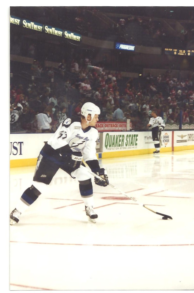 The Hopeful Chase: Gordie Howe in a Lightning Uniform and Other Photos
