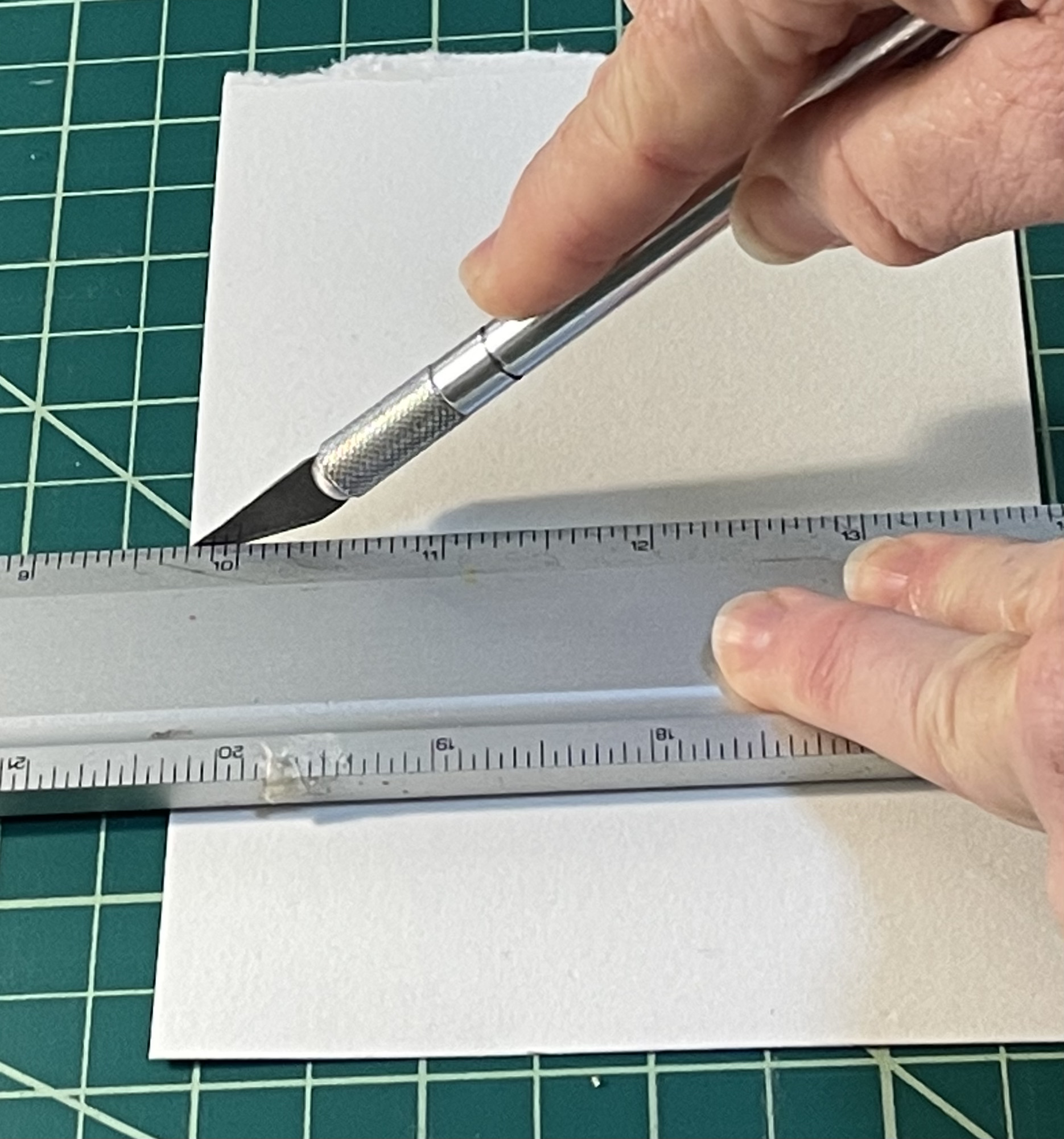 Cutting and Tearing Paper and the Binder's Fold