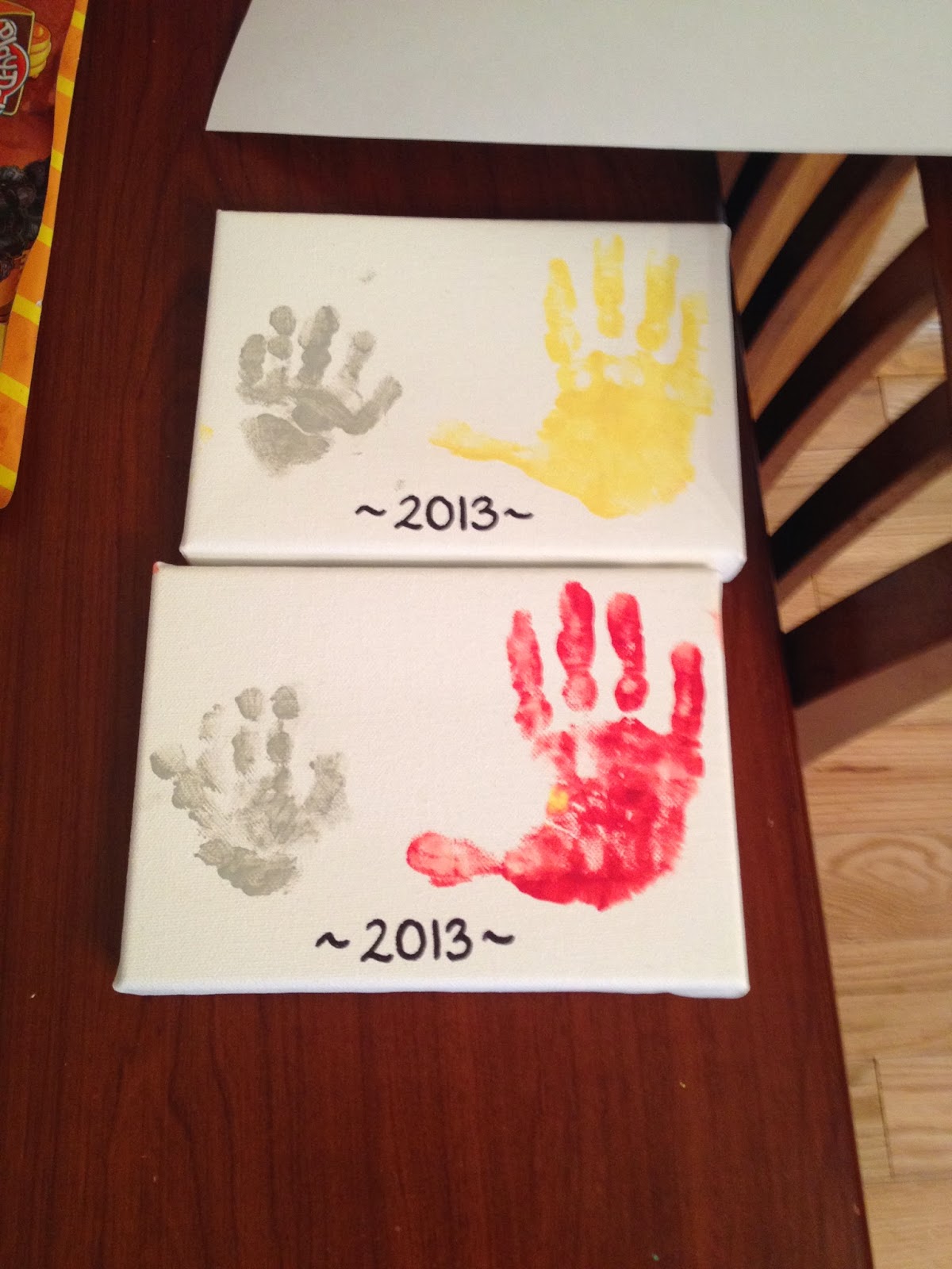 playing outside of the box: sibling handprints