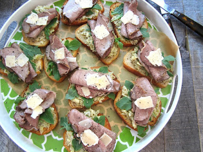 Filet of Beef Crostini w/ Artichoke Pesto & Parmesan Curls