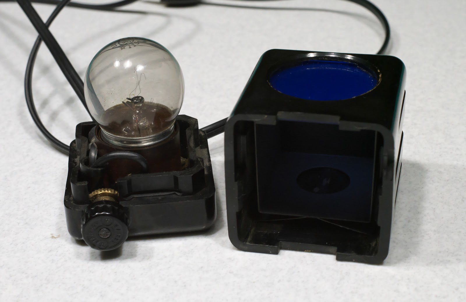 LED replacement for an incandescent bulb in a microscope illuminator