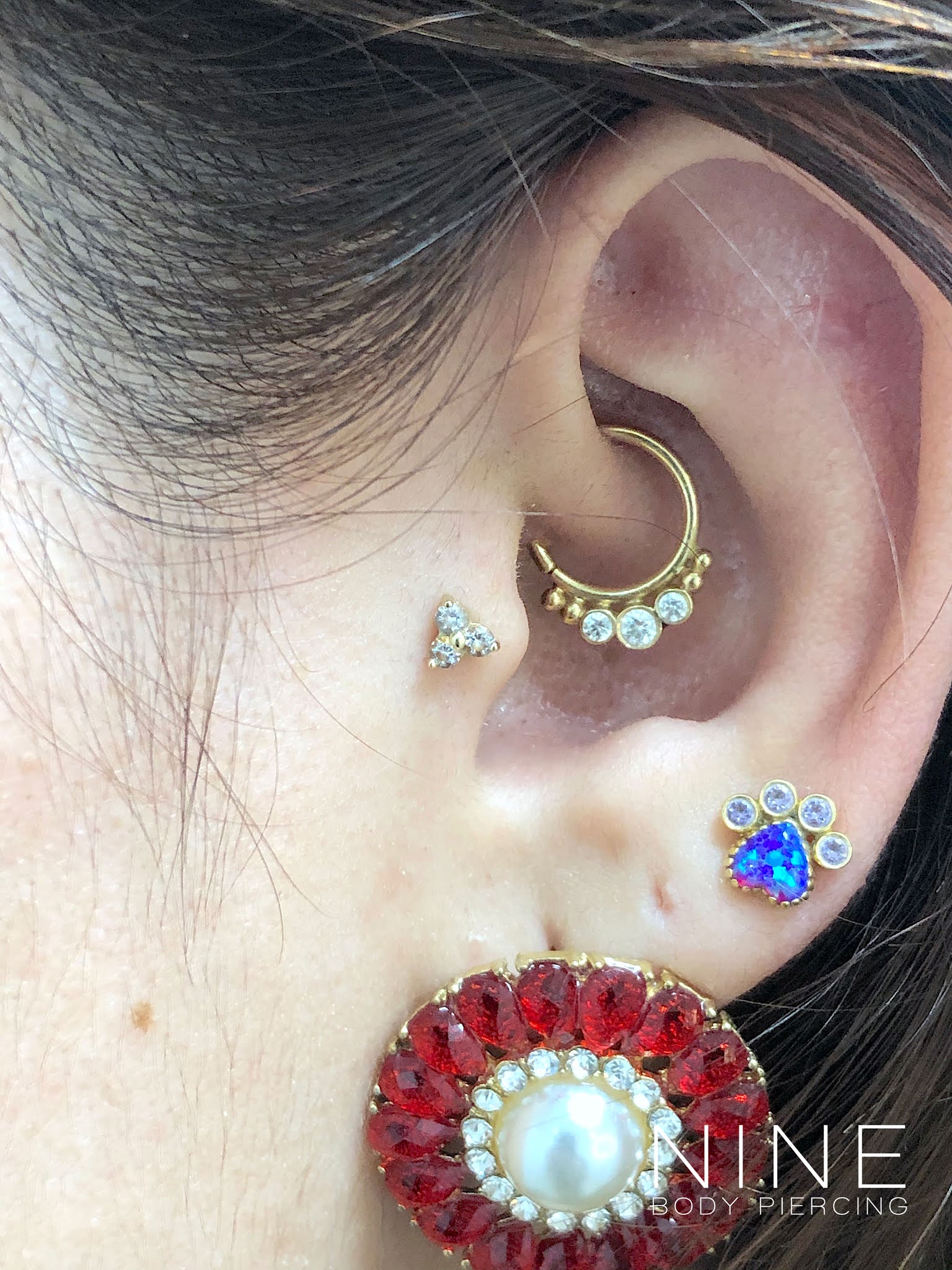 NINE BODY PIERCING BLOG: Tragus with BVLA Yellow Gold Tri Prong Cluster ...