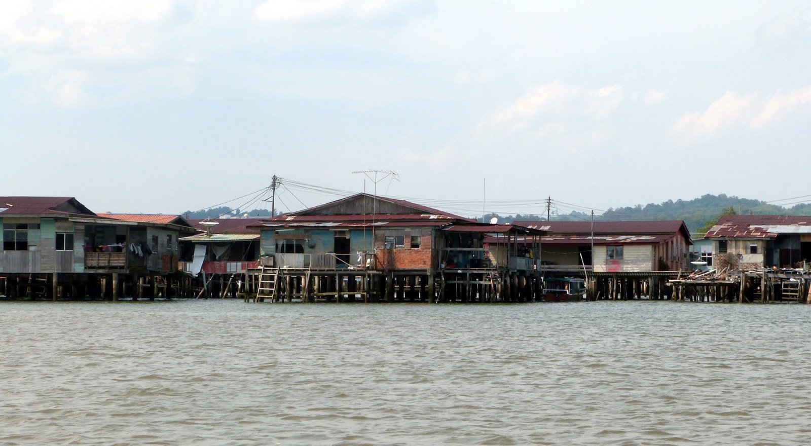 Cop Out's Big Adventures: Stilt village with the school