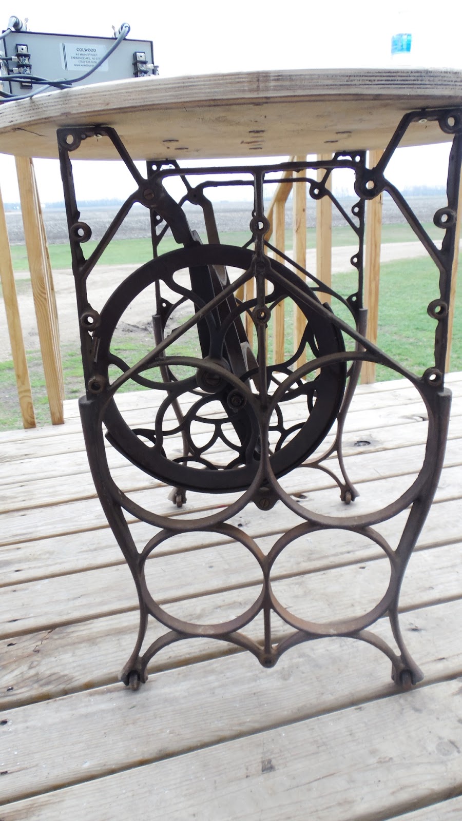 Wood Burned Garden Table With Sewing Machine Legs