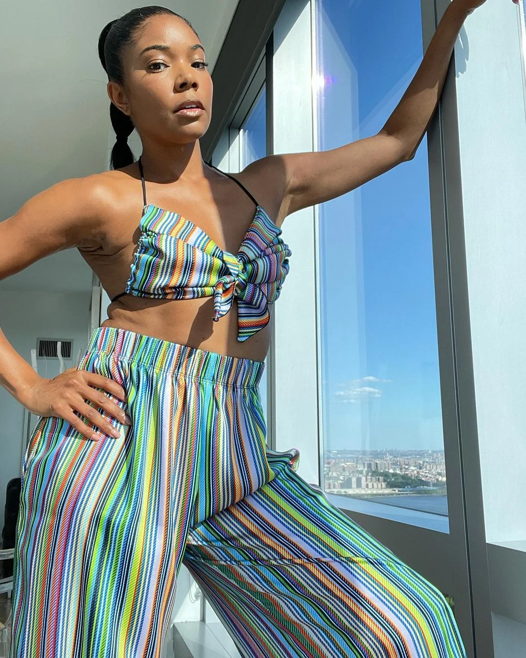 Gabrielle Union in Sammy B multi-stripe ''Dexter'' shirt and wide-leg pants. | Melody Jacob