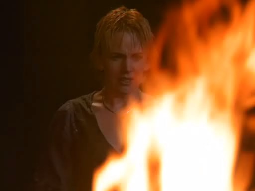 Alti comes outside laughing at Xena on the cross