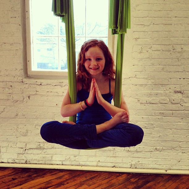 Sticks and Stripes: Aerial yoga taps into a child's imagination!