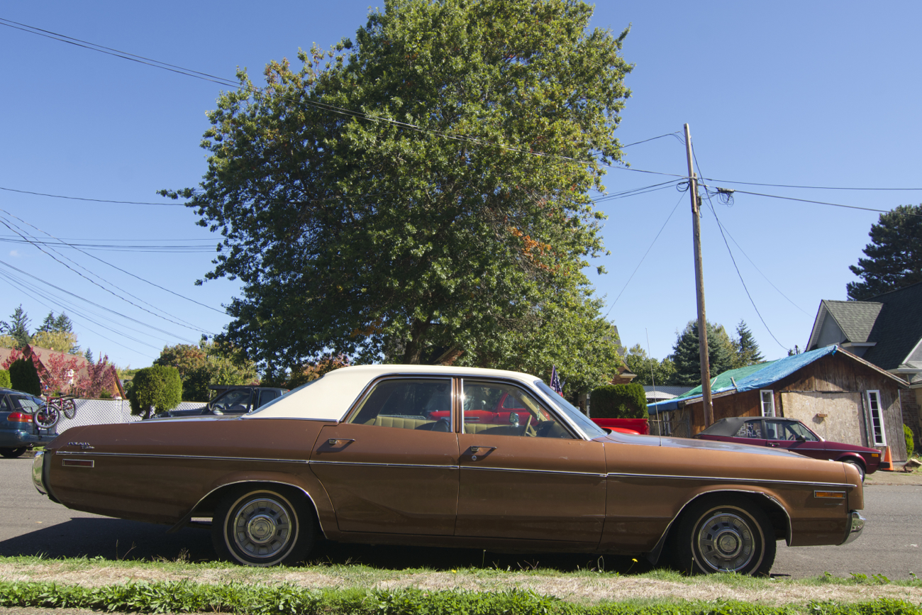 OLD PARKED CARS.: 1973 Dodge Polara Custom.
