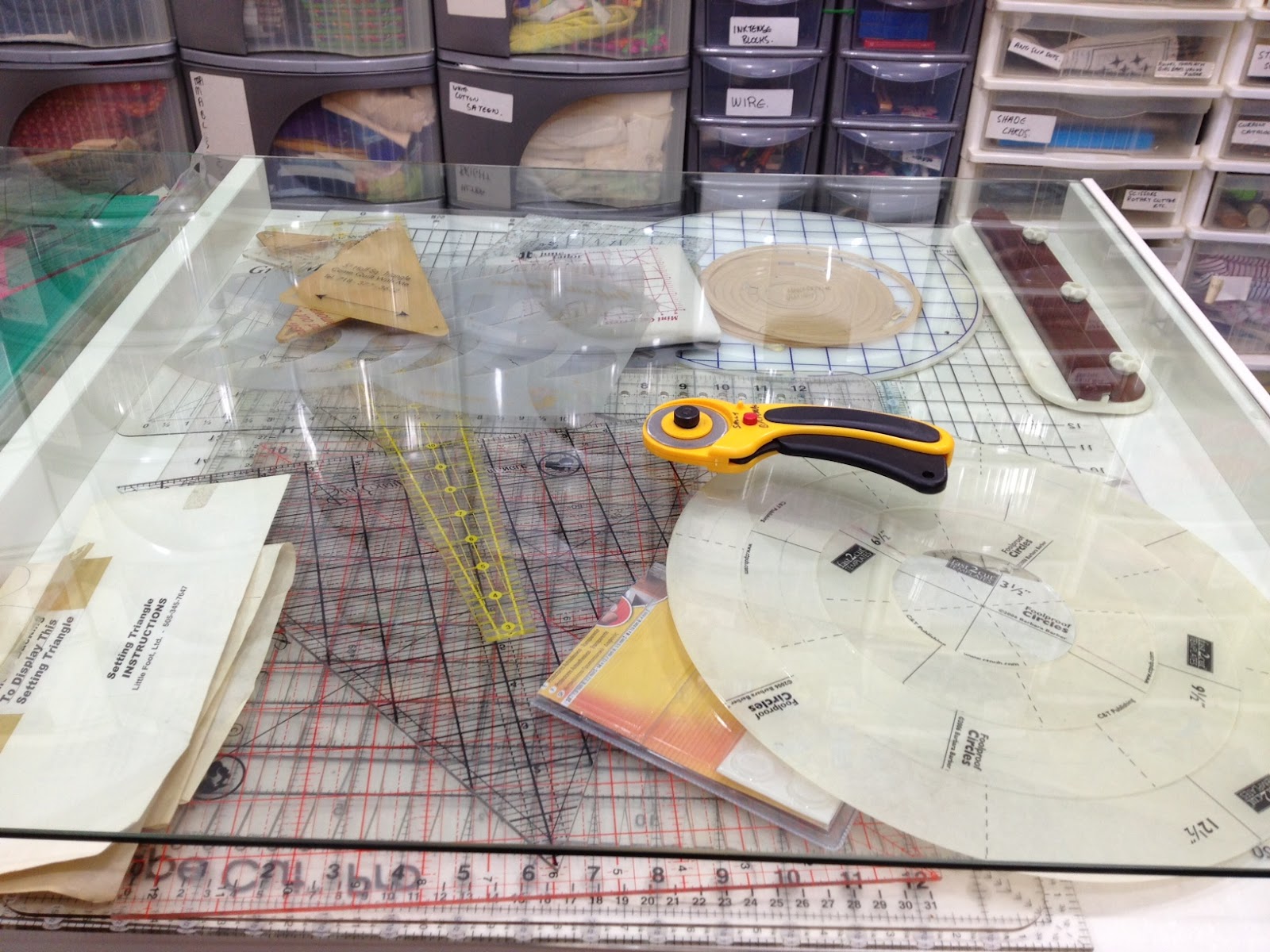 Feather On A Wire: Ruler storage.