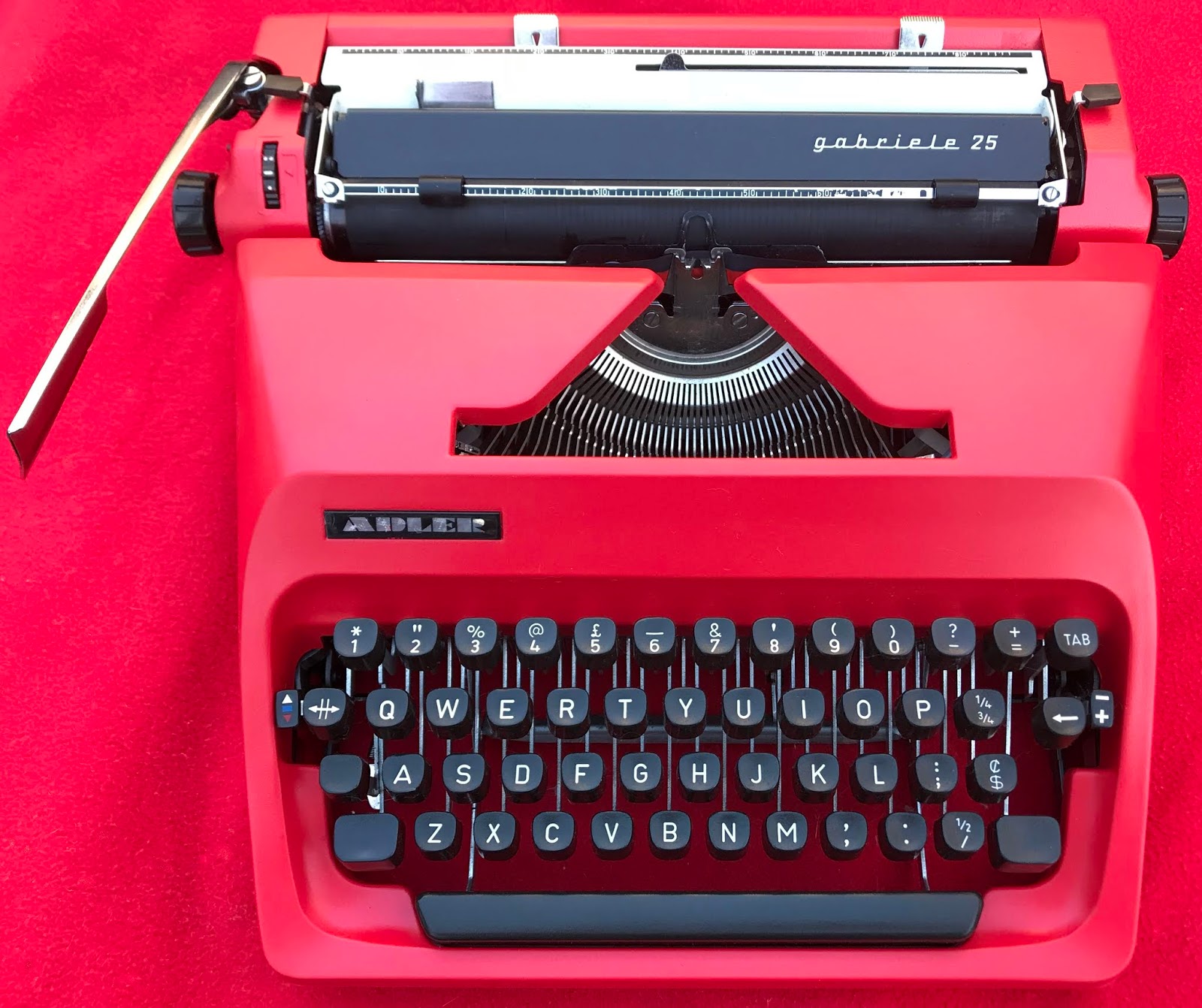 oz.Typewriter: The Poppy-Red Portable Typewriter
