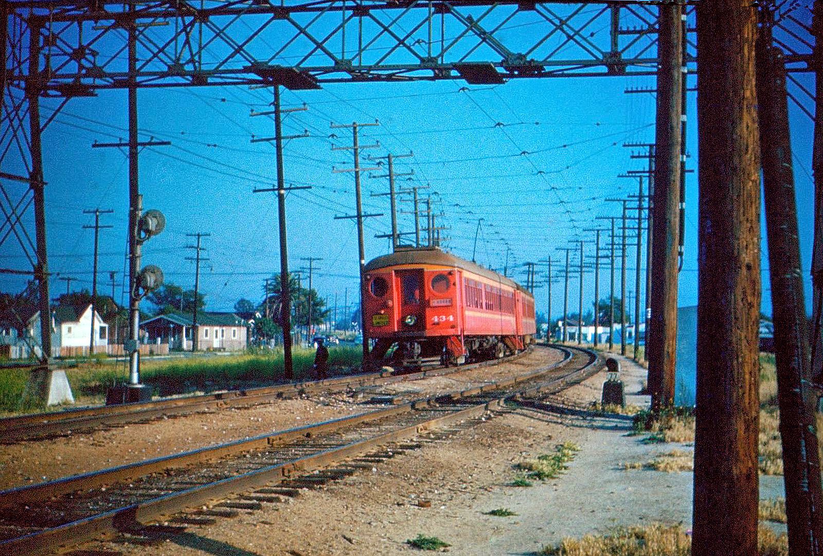 transpress nz: Pacific Electric trolley set at Watts Junction, L.A., 1951