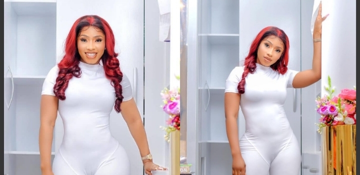 BBNaija Mercy Eke Stuns In White Jumpsuit As She Advertises For Mapia - MIMI'S BLOG