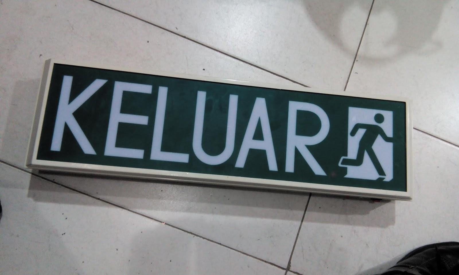 Life Begins at Forty: KELUAR sign repair
