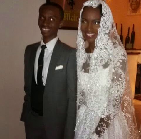 Bello El-Rufai and his wife, Kamilah in their English wedding outfits