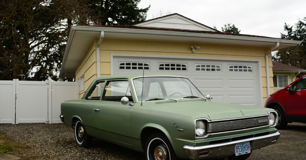 OLD PARKED CARS.: 1966 Rambler American 220.