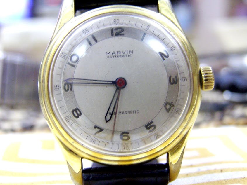 wristwatch: AUTHENTIC MARVIN AUTOMATIC BUMPER GENTS WRISTWATCH