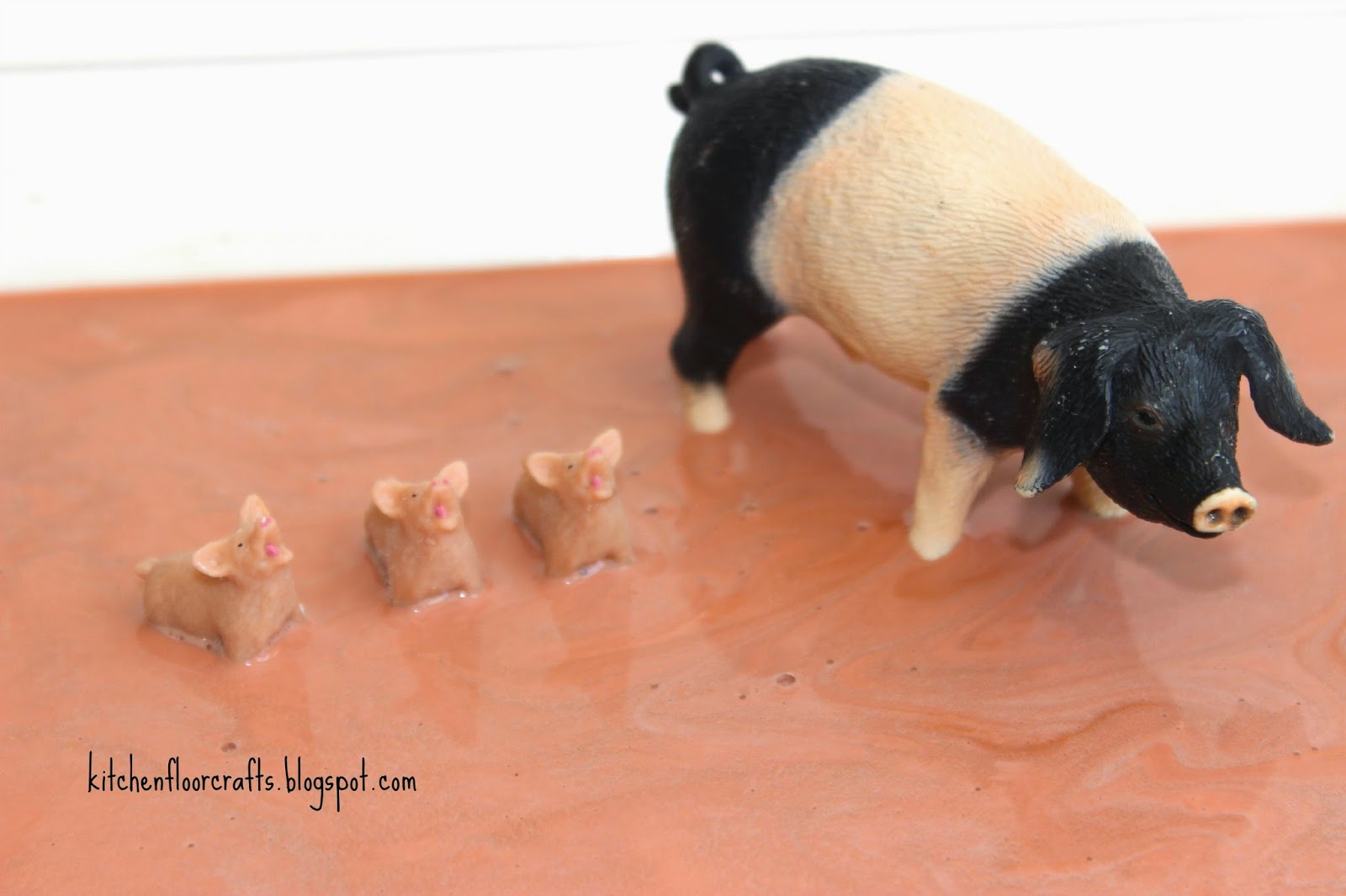 Kitchen Floor Crafts: Pigs in the Mud (Pretend Sensory Play)