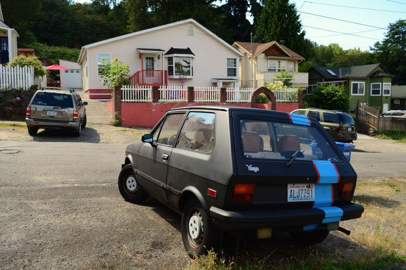 OLD PARKED CARS.: 1987 Yugo GV.